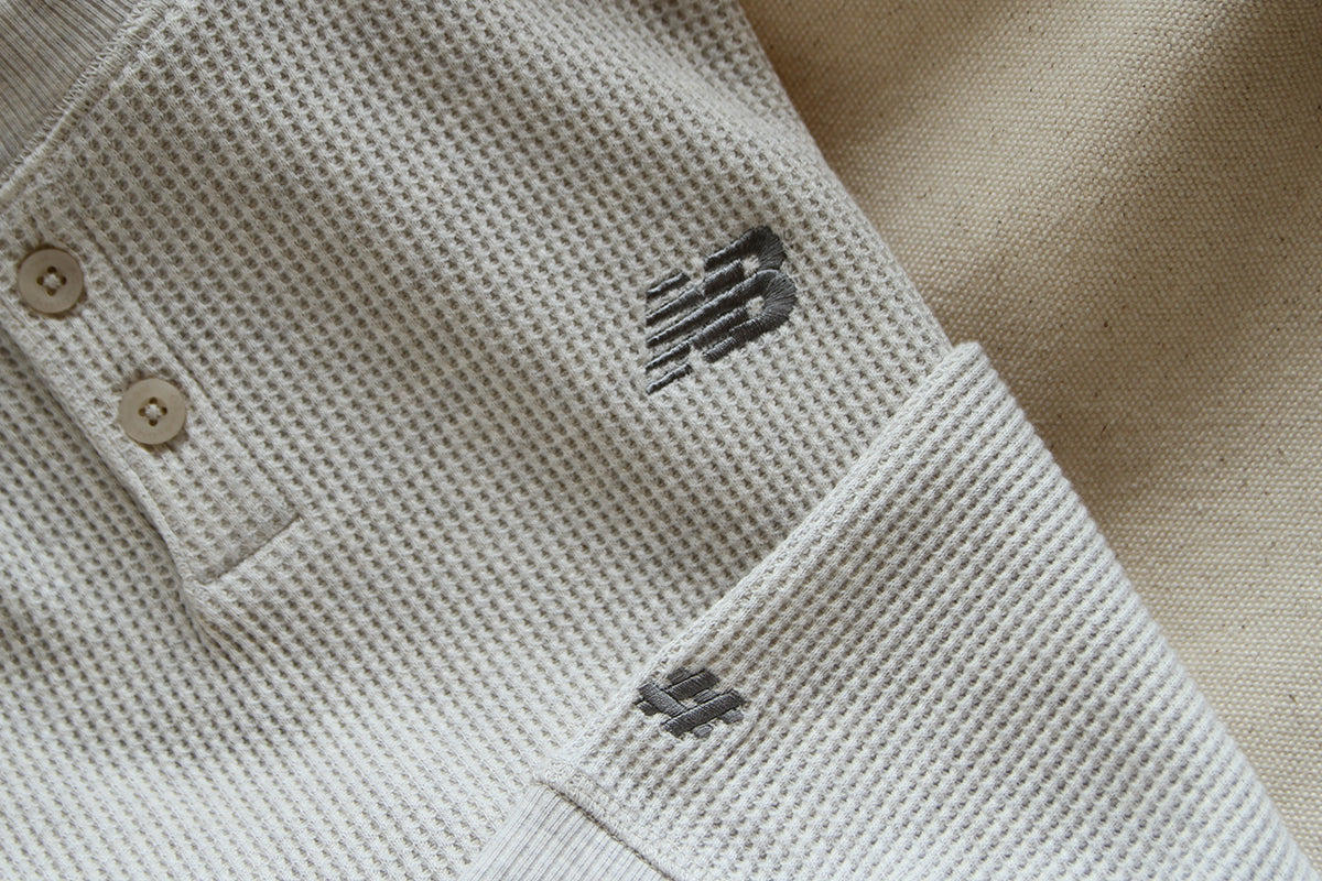 NEW BALANCE # APPAREL – Premier